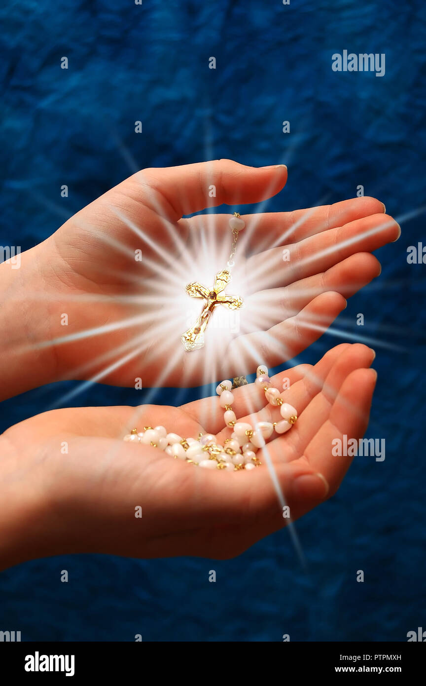 hands holding a rosary Stock Photo - Alamy