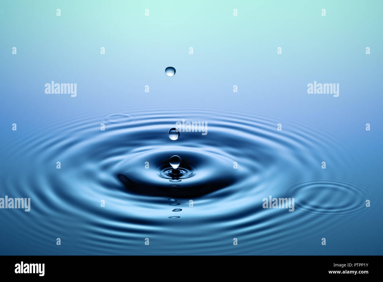 Water splash. Falling drop of rain Stock Photo - Alamy
