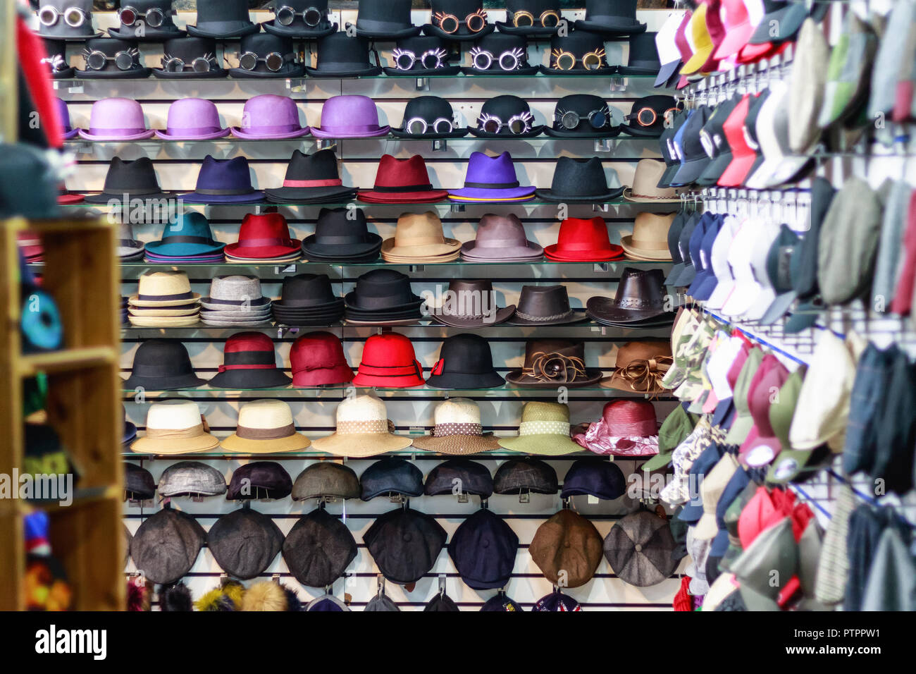 Variety of hats on display at Camden Market in London Stock Photo - Alamy