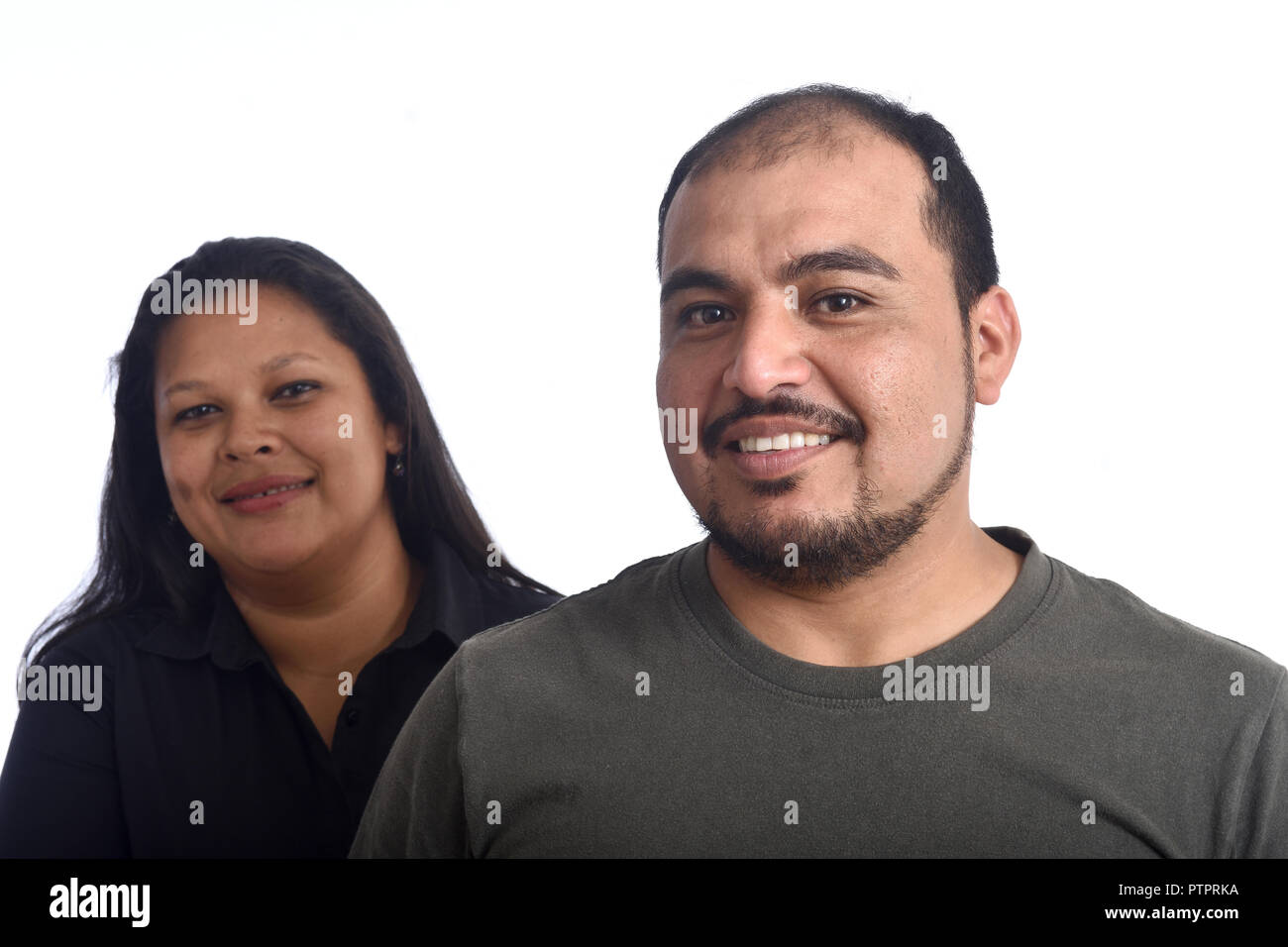 portrait of a latin america couple on white Stock Photo - Alamy