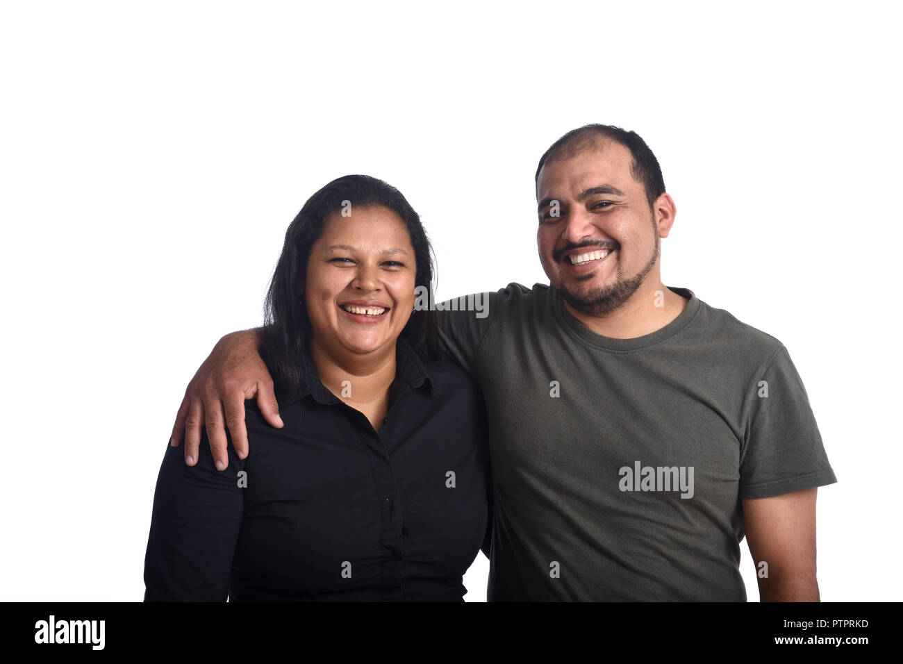 portrait of a latin america couple on white Stock Photo - Alamy
