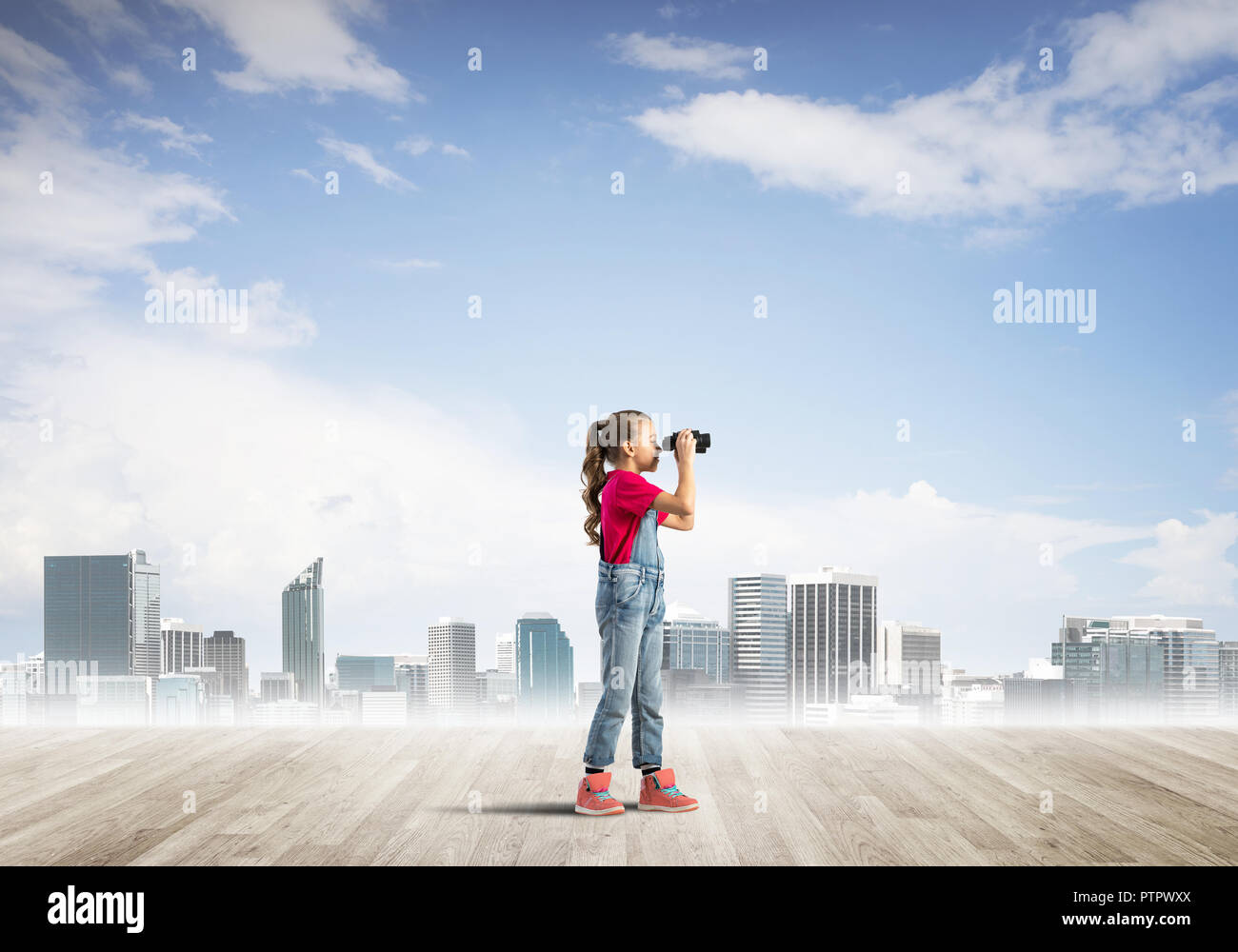 Concept of careless happy childhood with girl dreaming about future ...