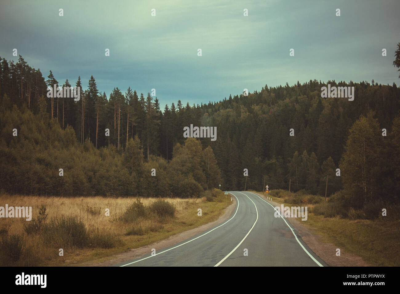 Russian roads in Karelia. Travel by road. Asphalt road. Smooth road car ...