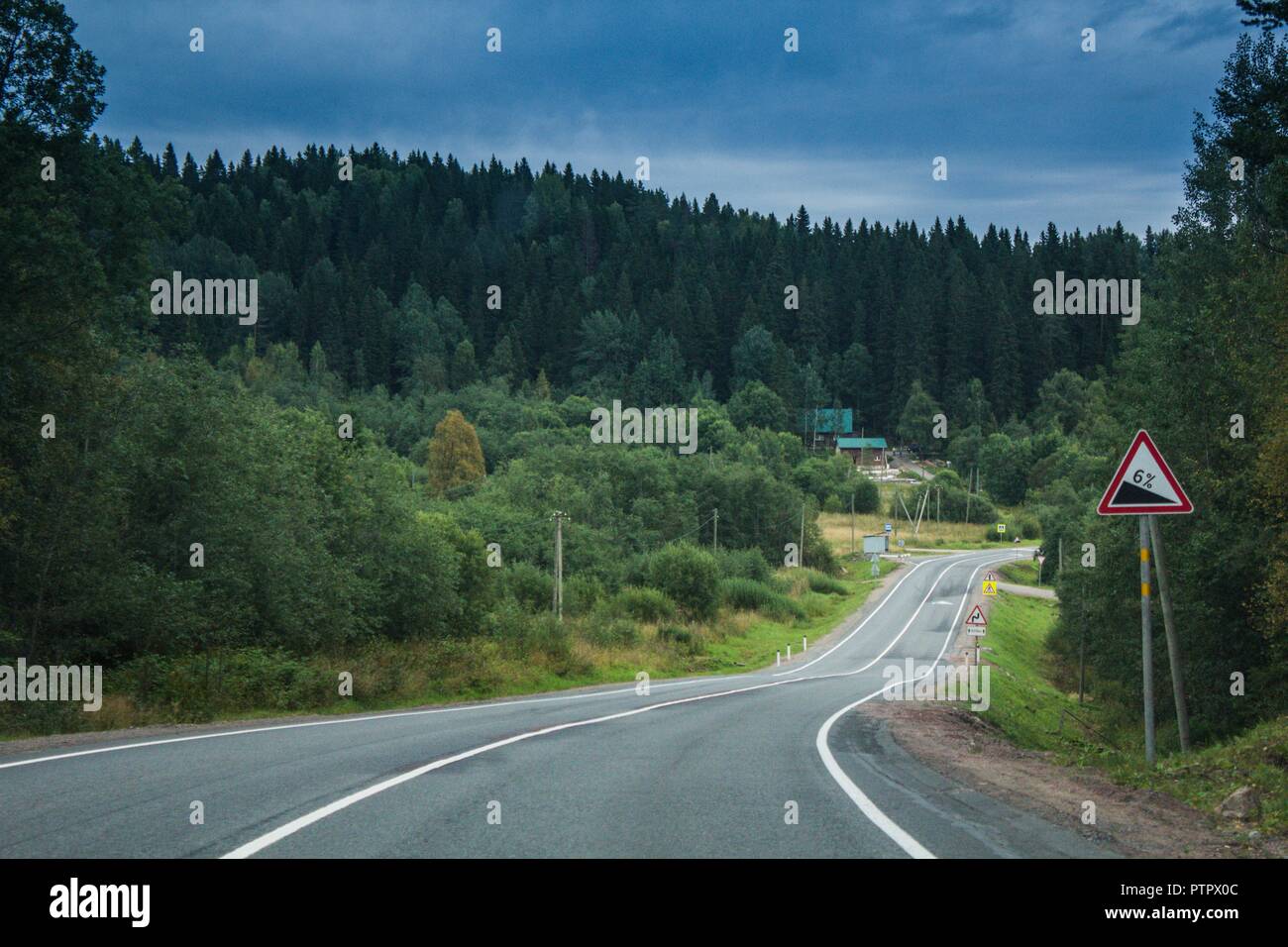 Russian roads in Karelia. Travel by road. Asphalt road. Smooth road car ...