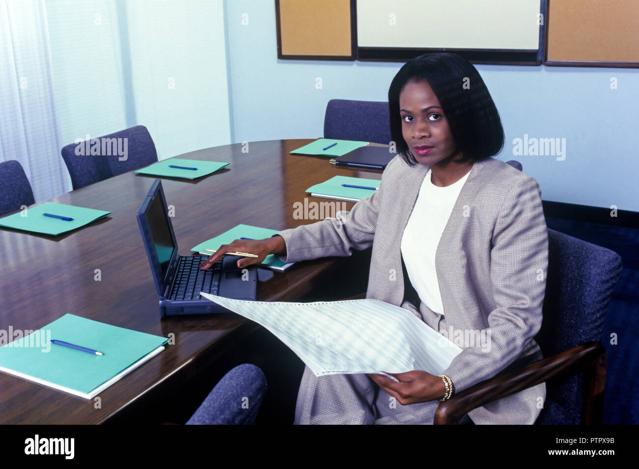 1995 HISTORICAL AFRICAN AMERICAN WOMAN OFFICE WORKER WITH LAPTOP ...