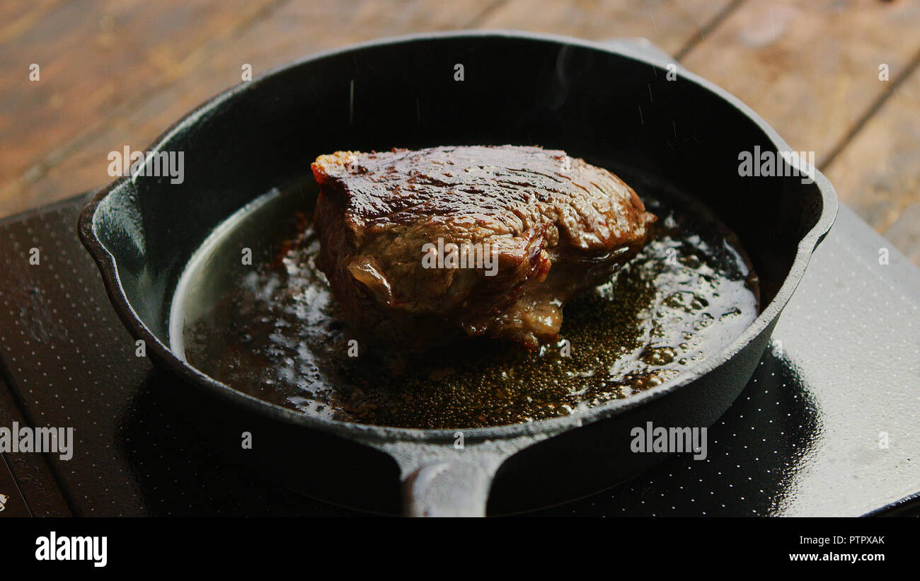 Hot iron skillet on stove hi-res stock photography and images - Alamy