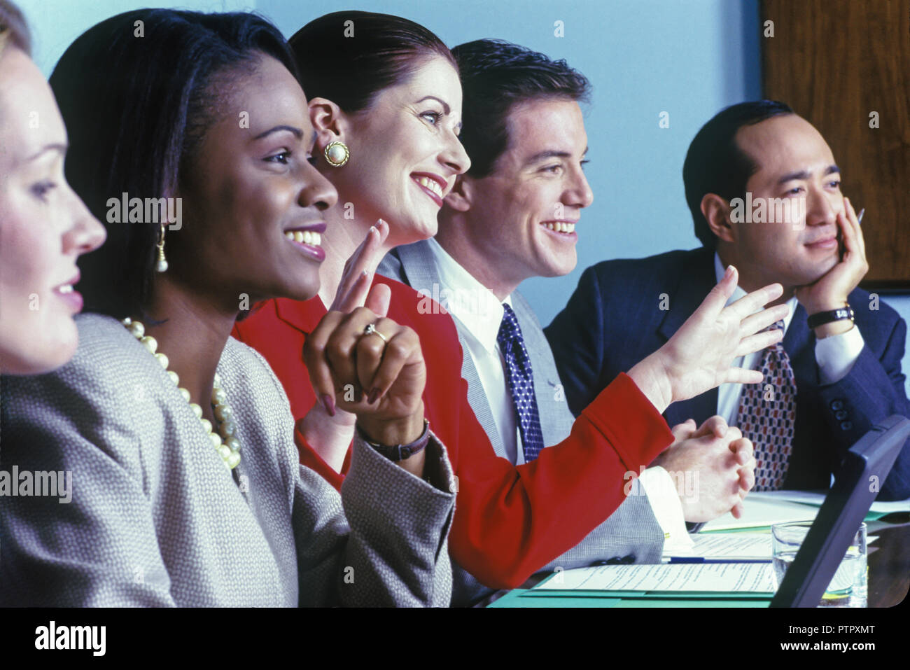 1995 HISTORICAL MULTI ETHNIC OFFICE WORKERS IN BOARDROOM MEETING Stock ...