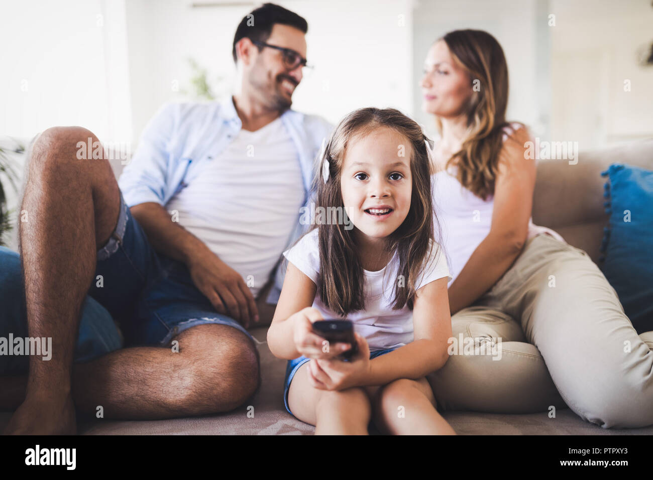 Happy family having fun time at home Stock Photo - Alamy
