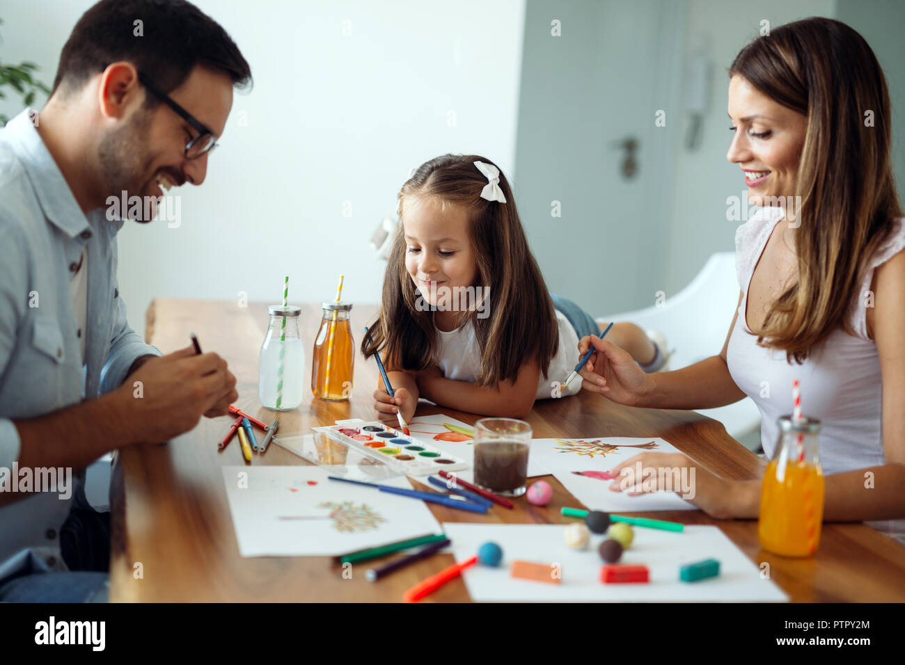 Happy family having fun time at home Stock Photo - Alamy