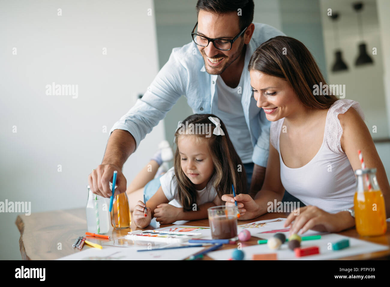 Happy family having fun time at home Stock Photo - Alamy