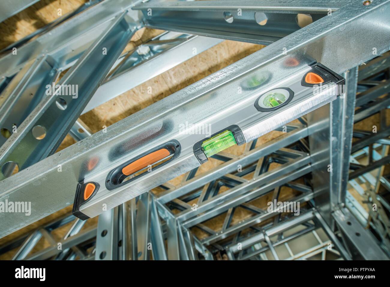 Leveling Tool and Steel Skeleton Frame Construction. Industrial Theme ...