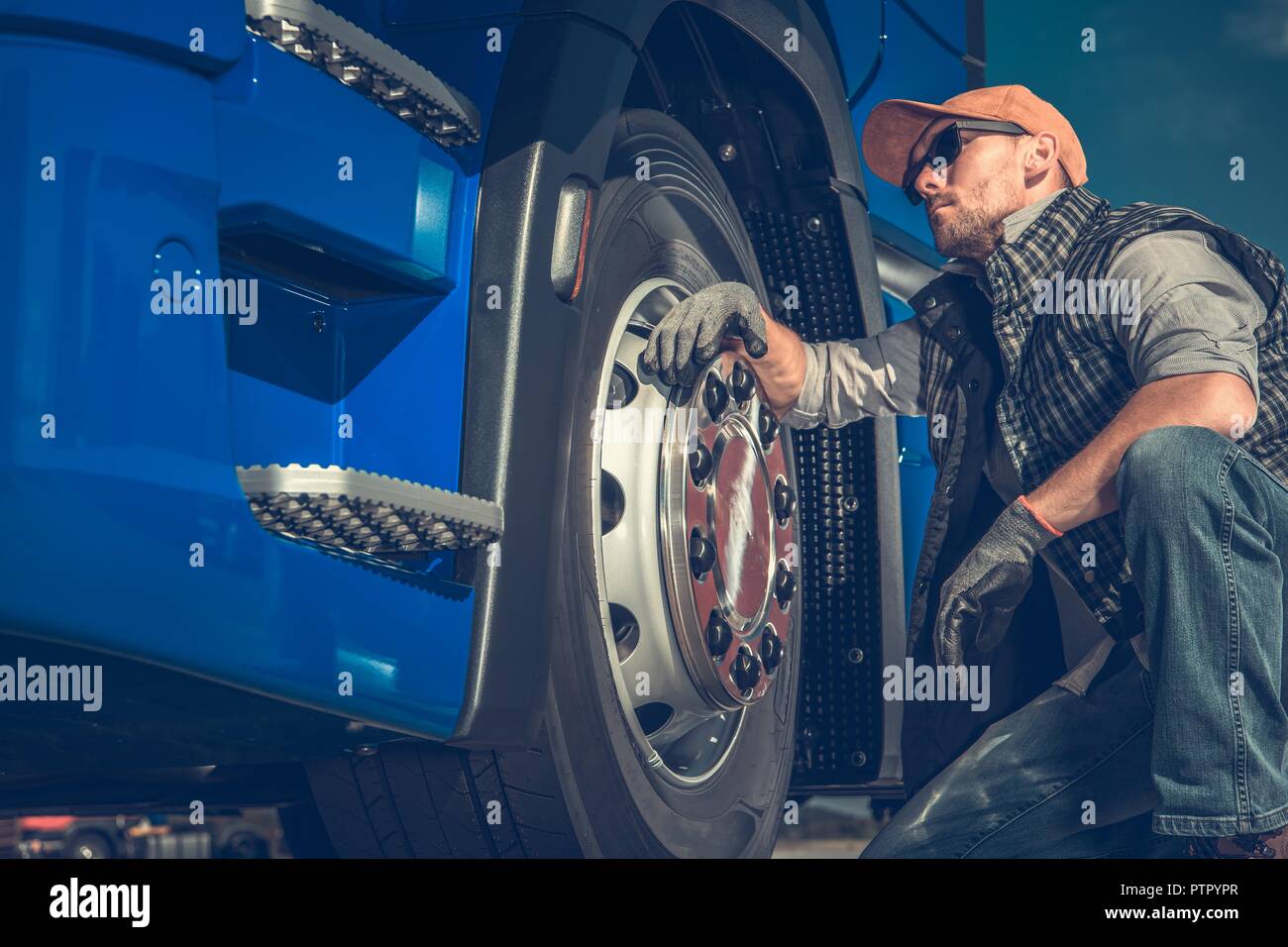 Tires checking hi-res stock photography and images - Alamy