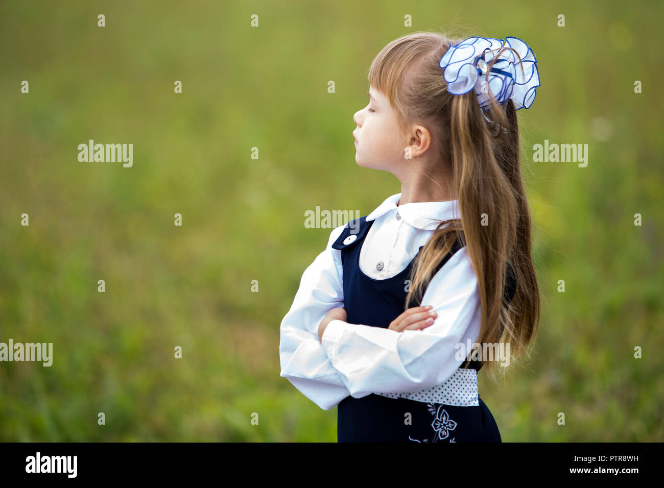 School girl profile school uniform hi-res stock photography and images ...