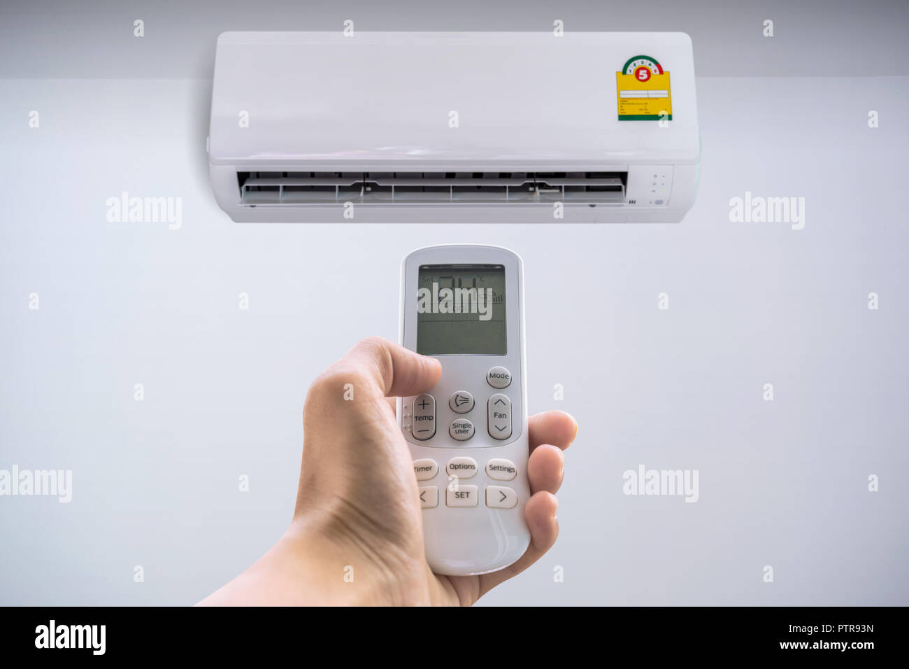 Air conditioner with remote controller Stock Photo - Alamy
