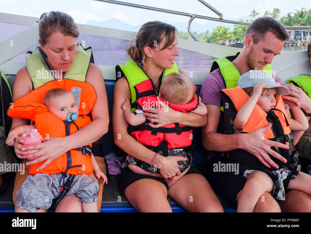 Wearing life jackets hi-res stock photography and images - Alamy