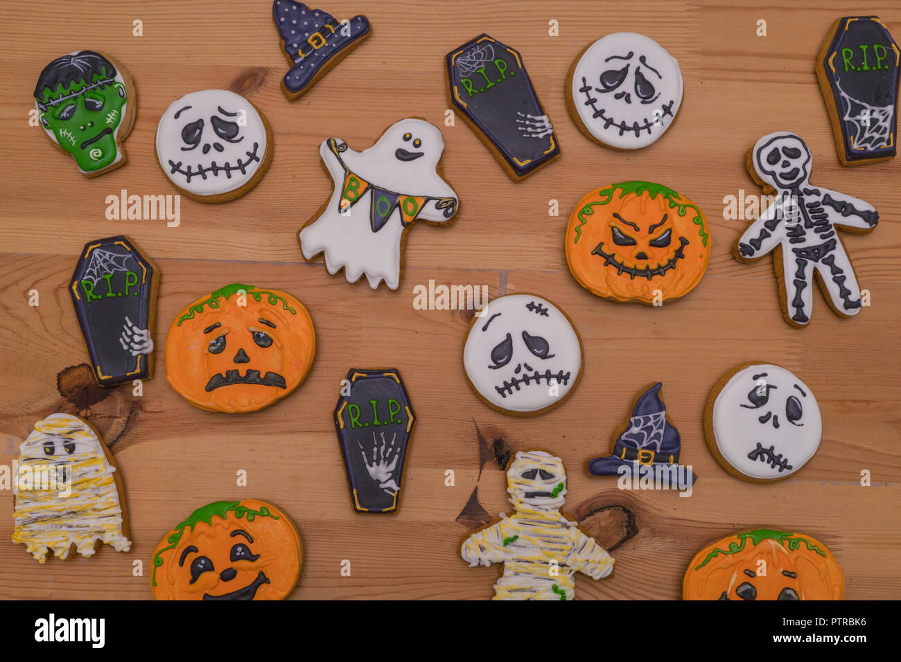 Sweet gingerbread emoticons ghosts and pumpkins, witches hats on a ...