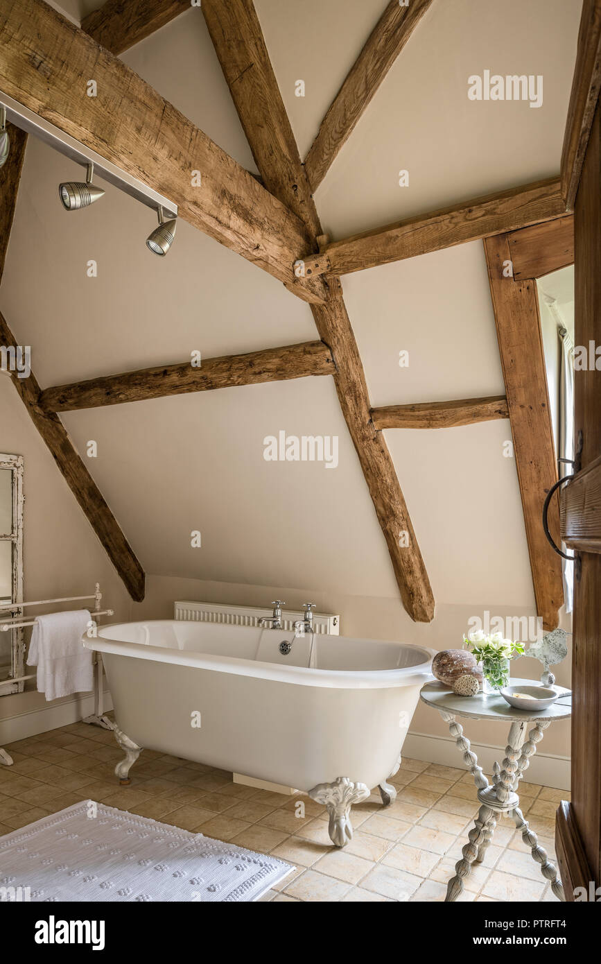 16th century farmhouse renovation Freestanding bath below timber framed ...