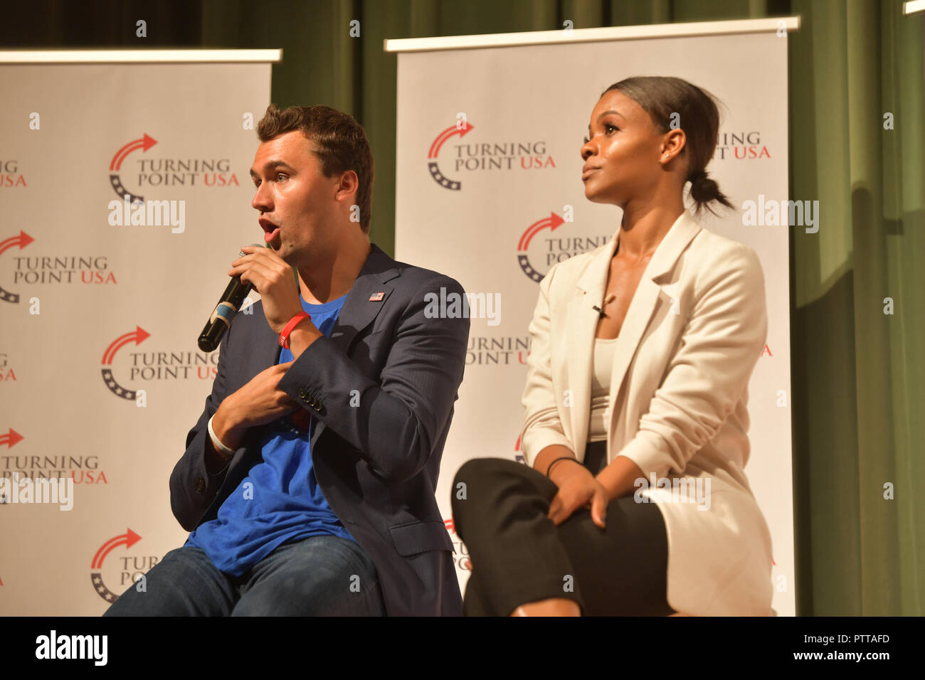 DAVIE, FL - JUNE 18: Charlie Kirk, Candy Owens speak at Nova High ...
