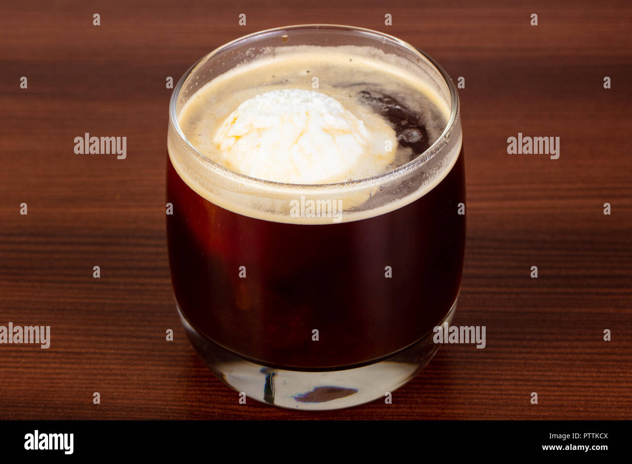 Cup an ice-cream coffee in the table Stock Photo - Alamy