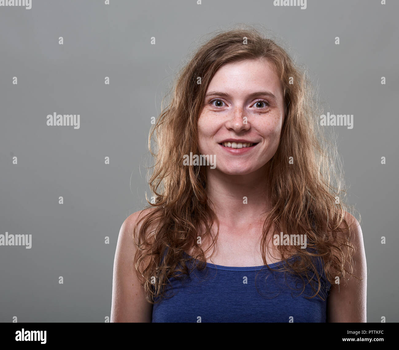 Closeup portrait of a beautiful woman with no makeup, studio shot on ...