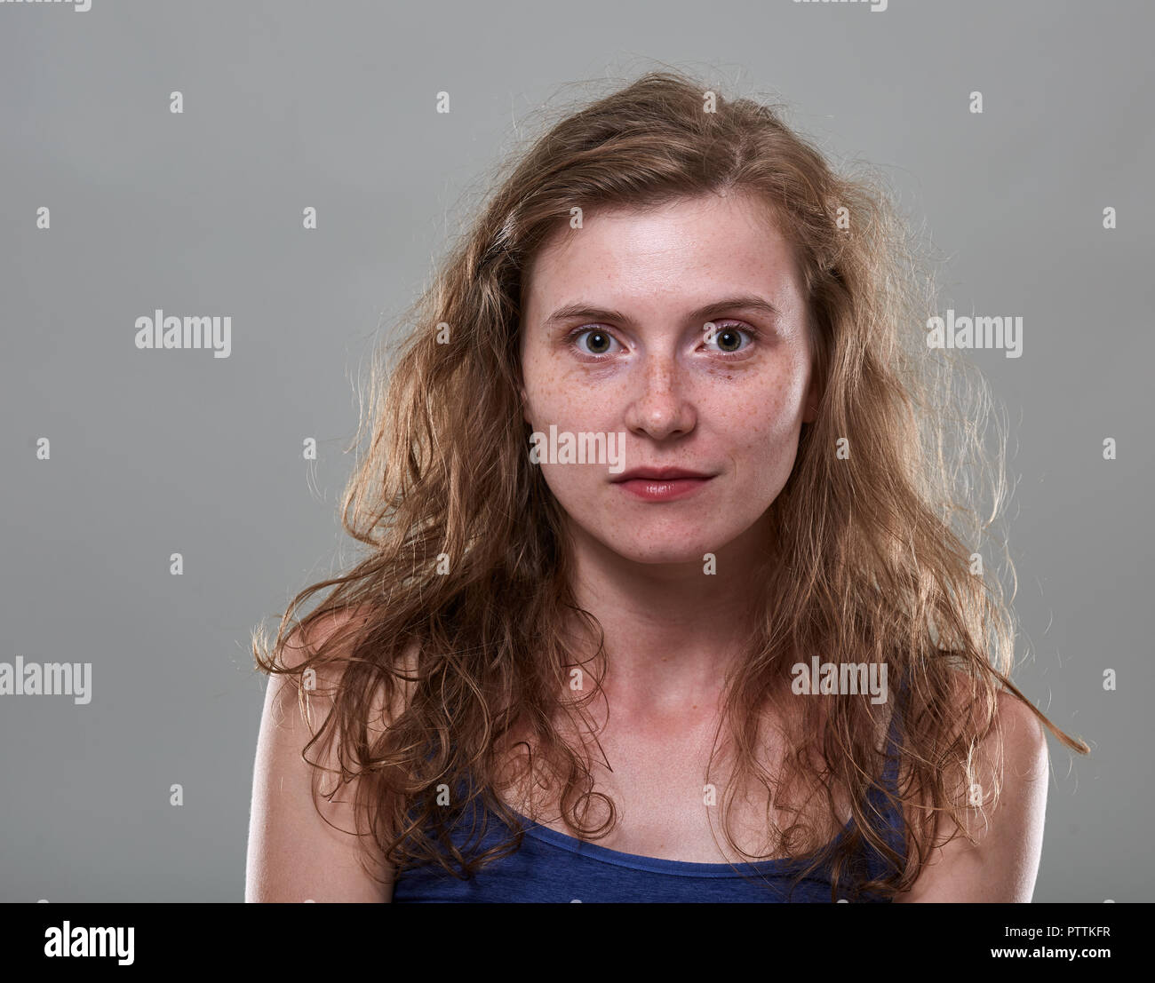 Closeup portrait of a beautiful woman with no makeup, studio shot on ...