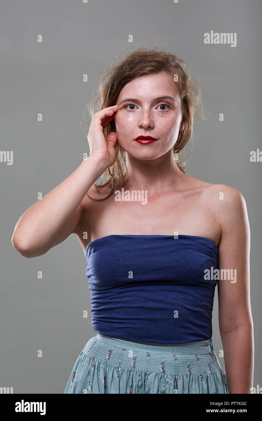 Closeup portrait of a beautiful woman with no makeup, studio shot on ...