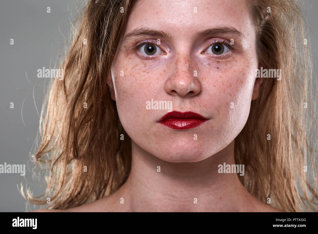 Closeup portrait of a beautiful woman with no makeup, studio shot on ...