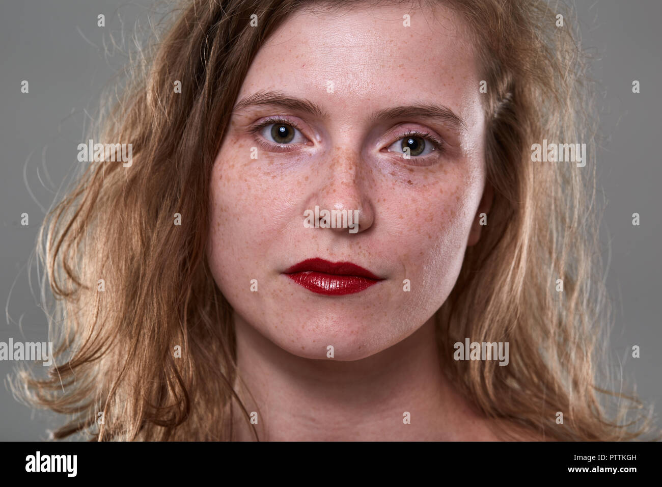 Closeup portrait of a beautiful woman with no makeup, studio shot on ...