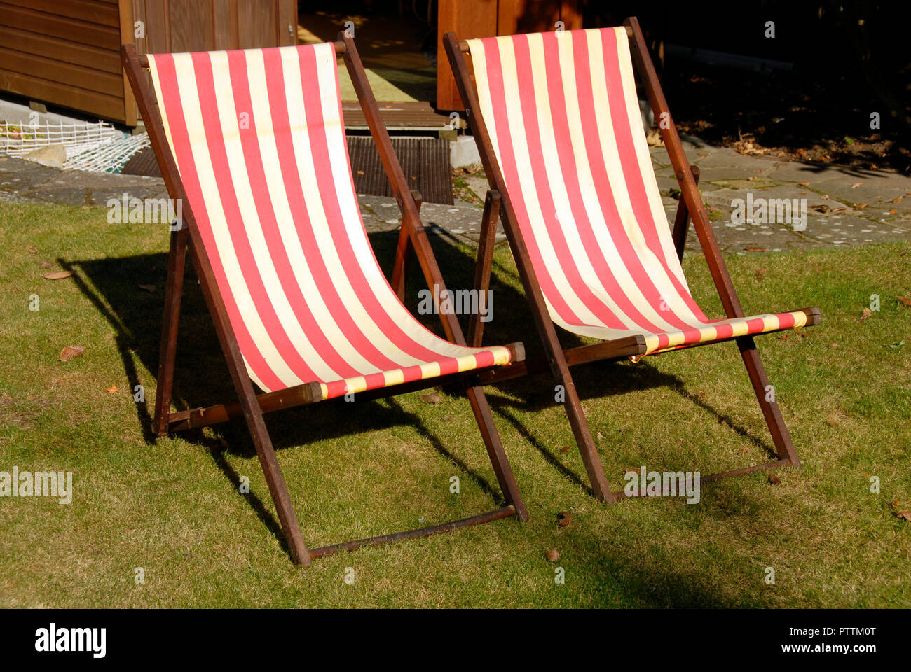 Couple deckchairs in garden hi-res stock photography and images - Alamy