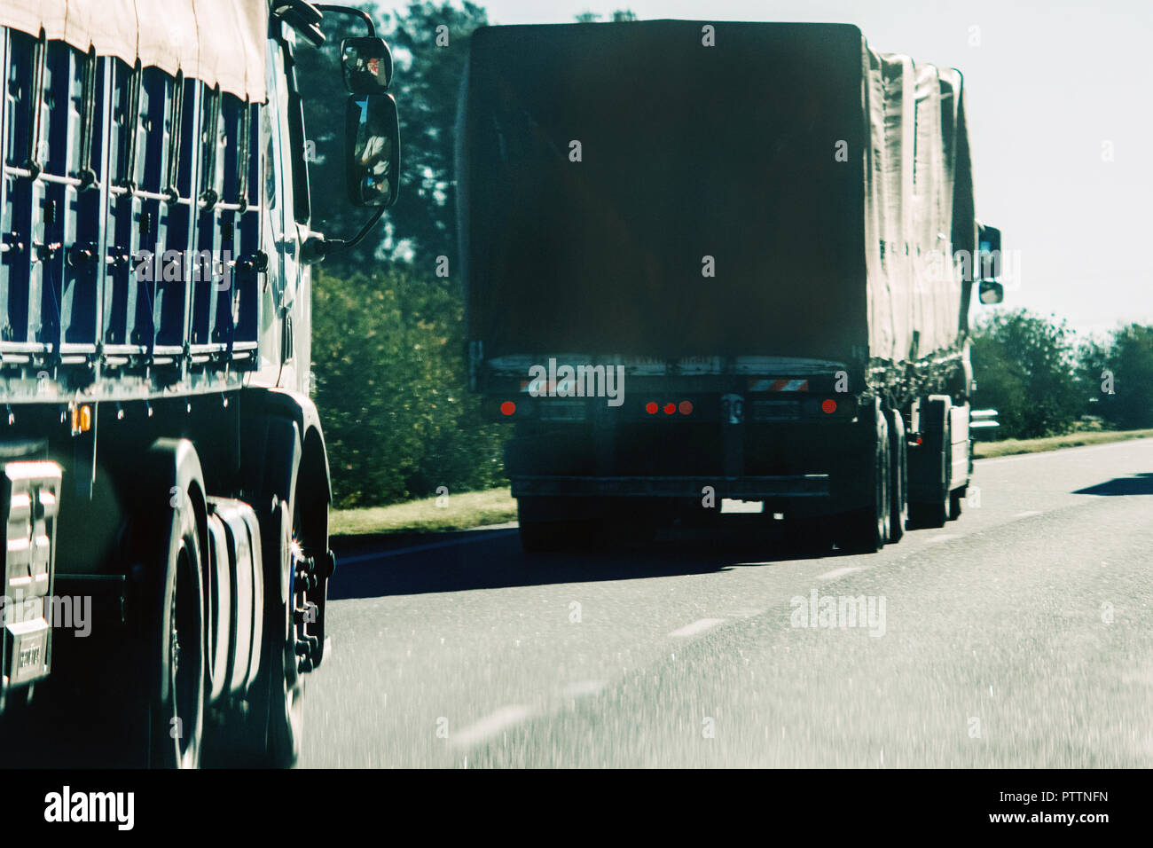Two Semi-Truck On Highway Stock Photo - Alamy