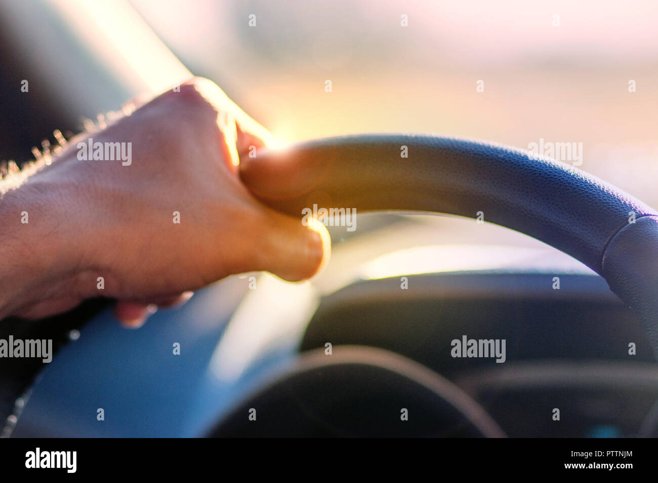 Man driving car sunset interior hi-res stock photography and images - Alamy