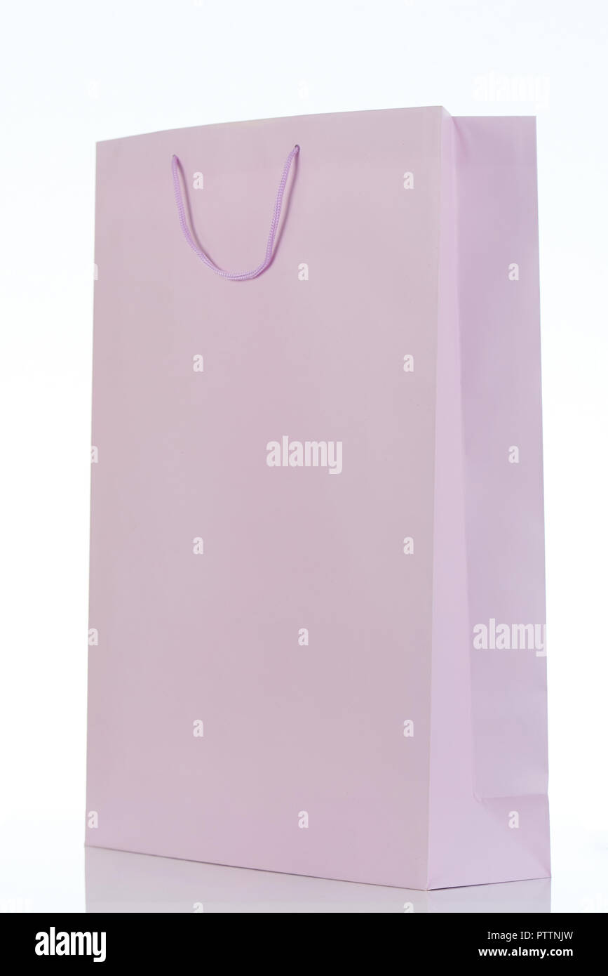 One light purple gift bag isolated on white background Stock Photo - Alamy