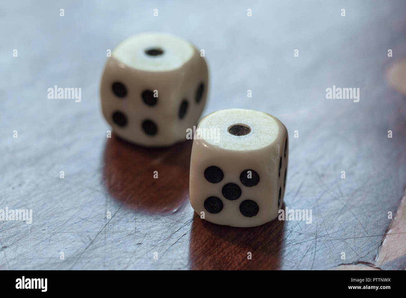 White dice on wooden background. Concept of luck, chance and leisure ...