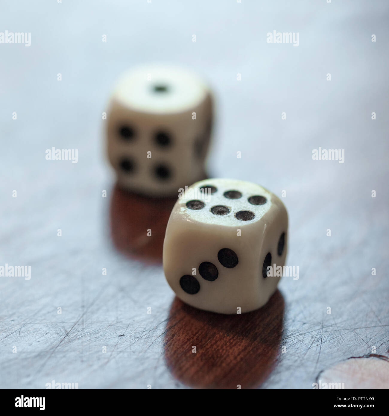 White dice on wooden background. Concept of luck, chance and leisure ...