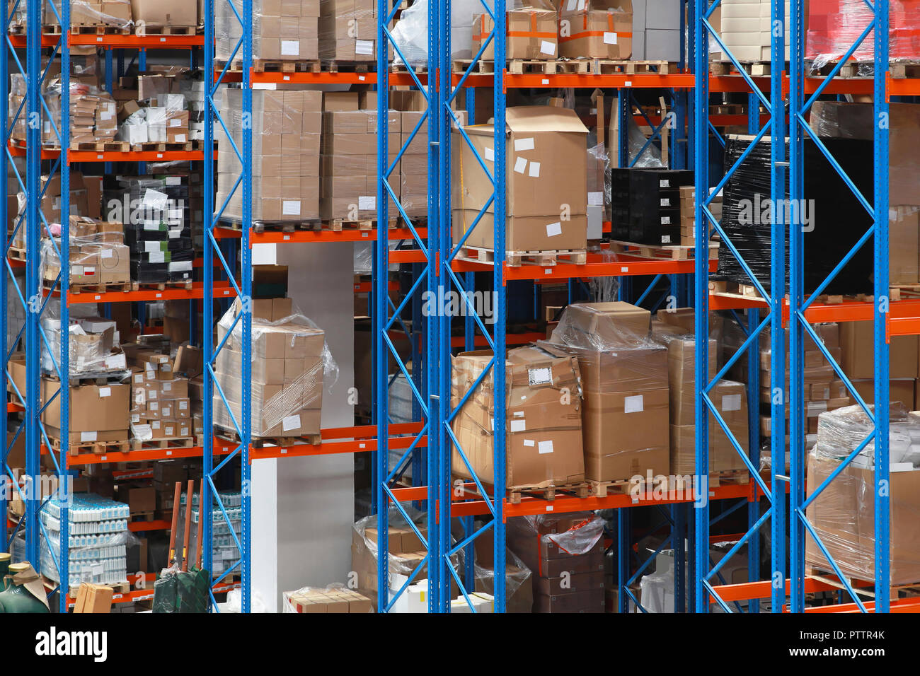 High rack shelving system in distribution warehouse Stock Photo - Alamy