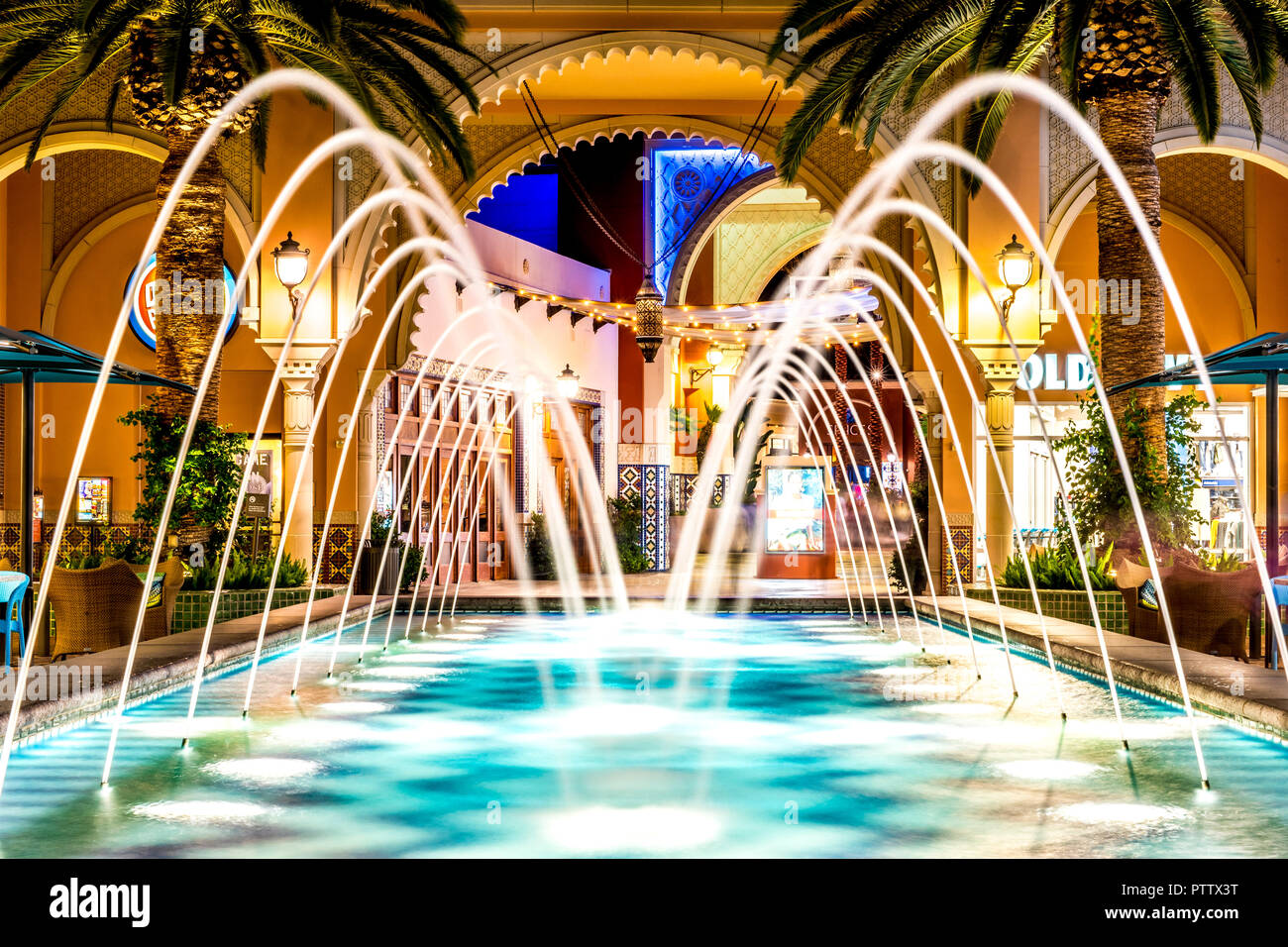 Fountain making arches of water Stock Photo - Alamy