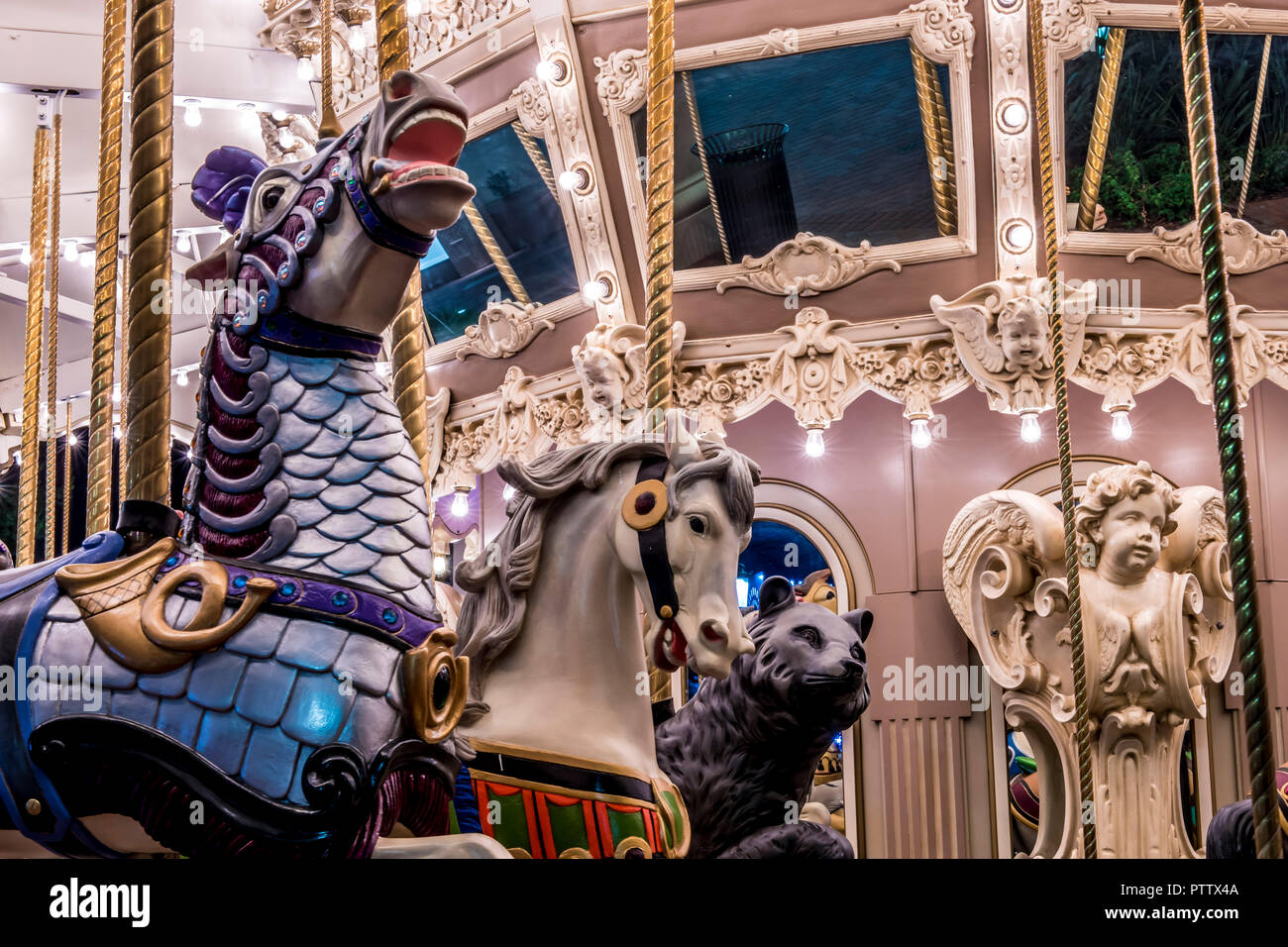 Horses on carousel Stock Photo - Alamy