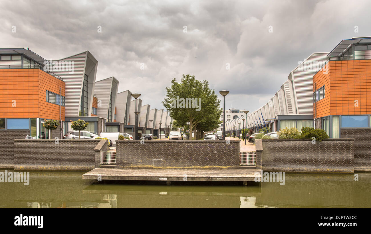 Modern street row houses and waterfront terrace in urban area of The ...