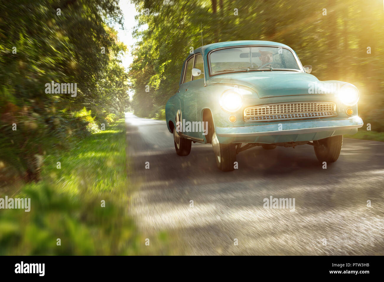 Classic car driving on road hi-res stock photography and images - Alamy
