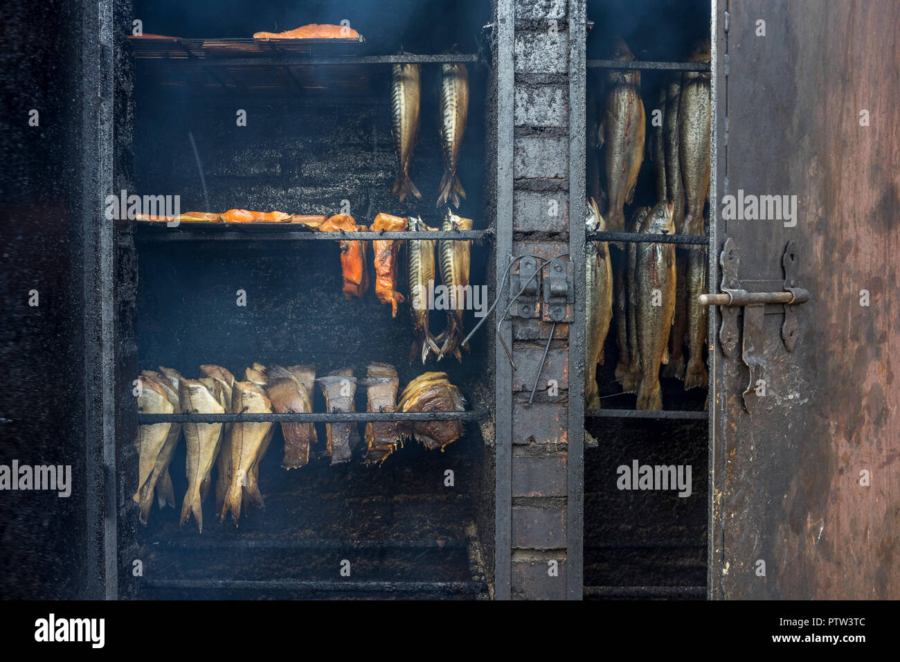 Fish is smoked in a smoker, Mielno, Poland 2018 Stock Photo - Alamy