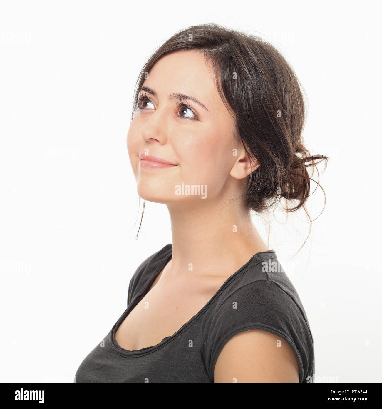 Woman looking upwards hi-res stock photography and images - Alamy