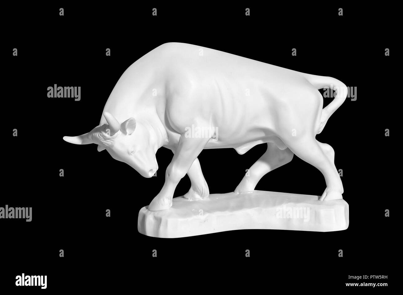 Classical marble statue of a bull on a black background Stock Photo - Alamy