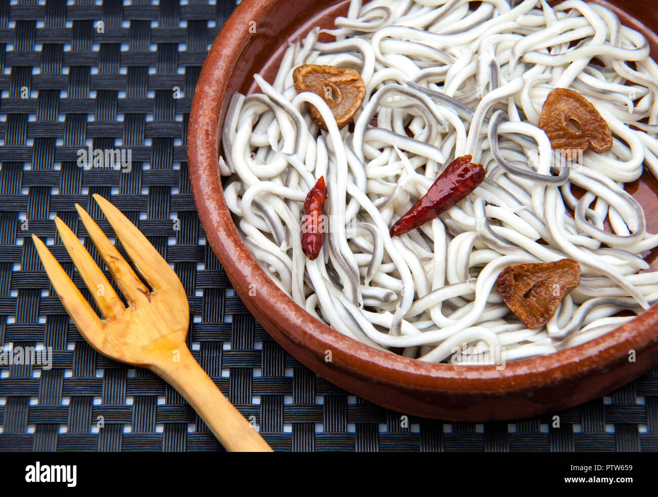 elvers cooked with garlic and bobby Stock Photo - Alamy