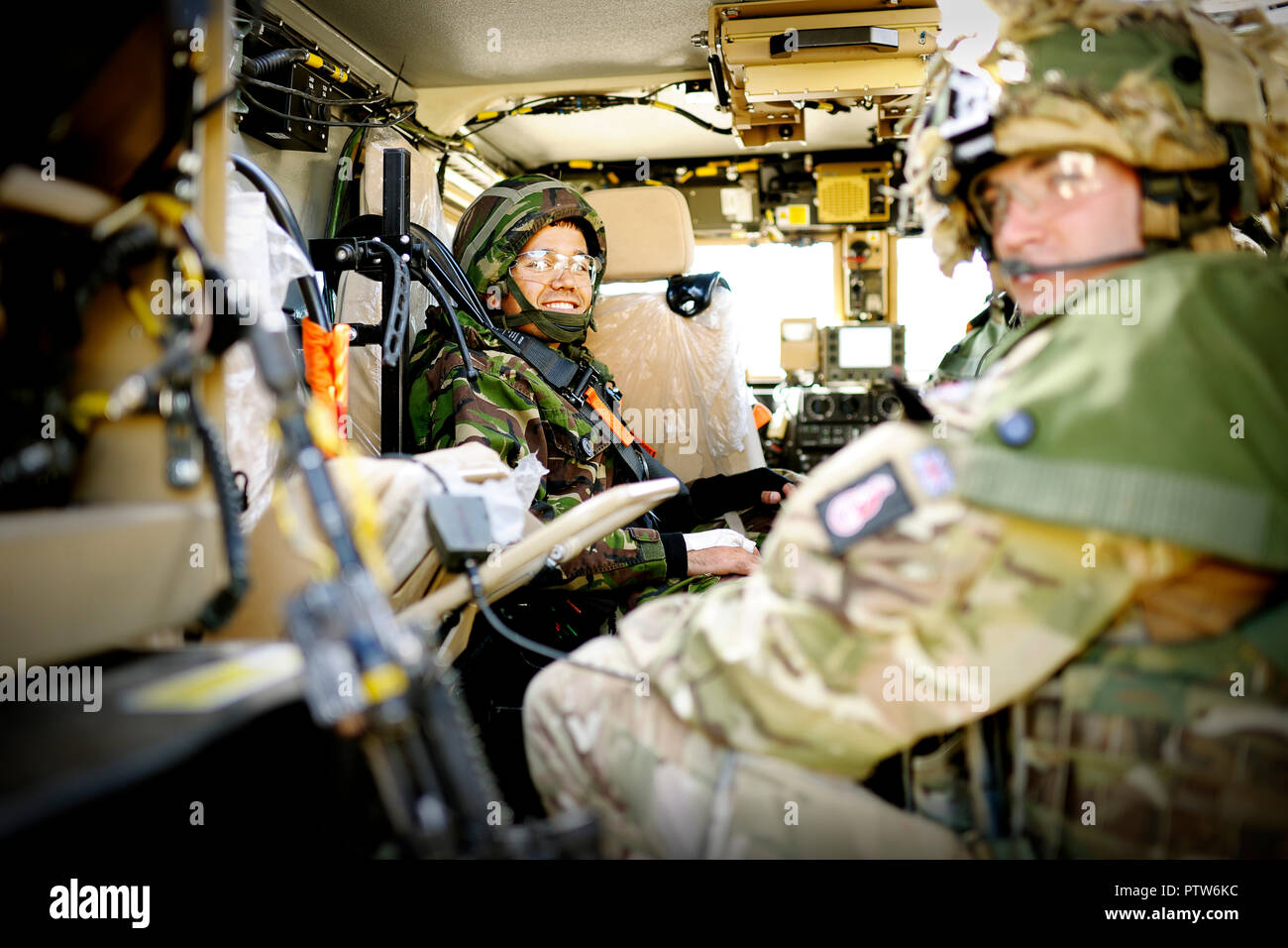 Army Infantryman inside an armoured personnel carrier Stock Photo - Alamy