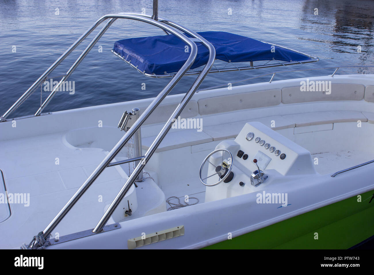 Detail of the motorboat control board. The boat is docked at sea Stock ...