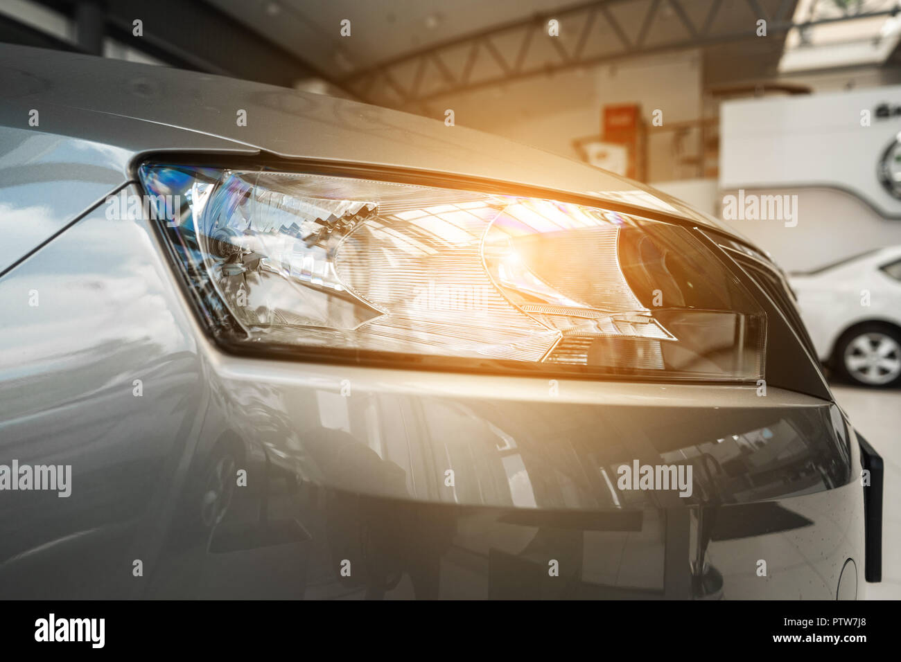 The headlamp of a modern prestigious car from a close angle Stock Photo ...