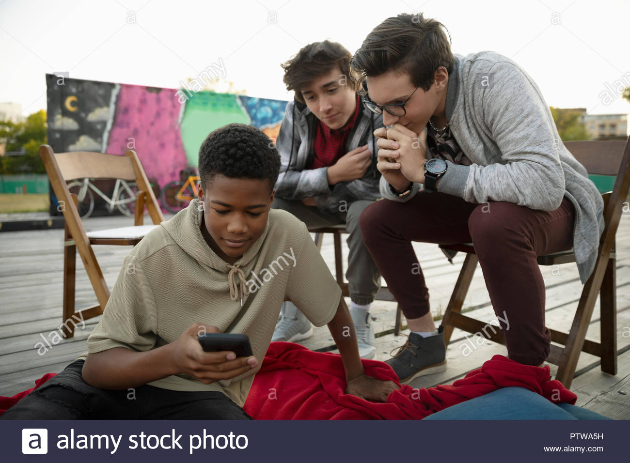 Boy hanging out hi-res stock photography and images - Alamy