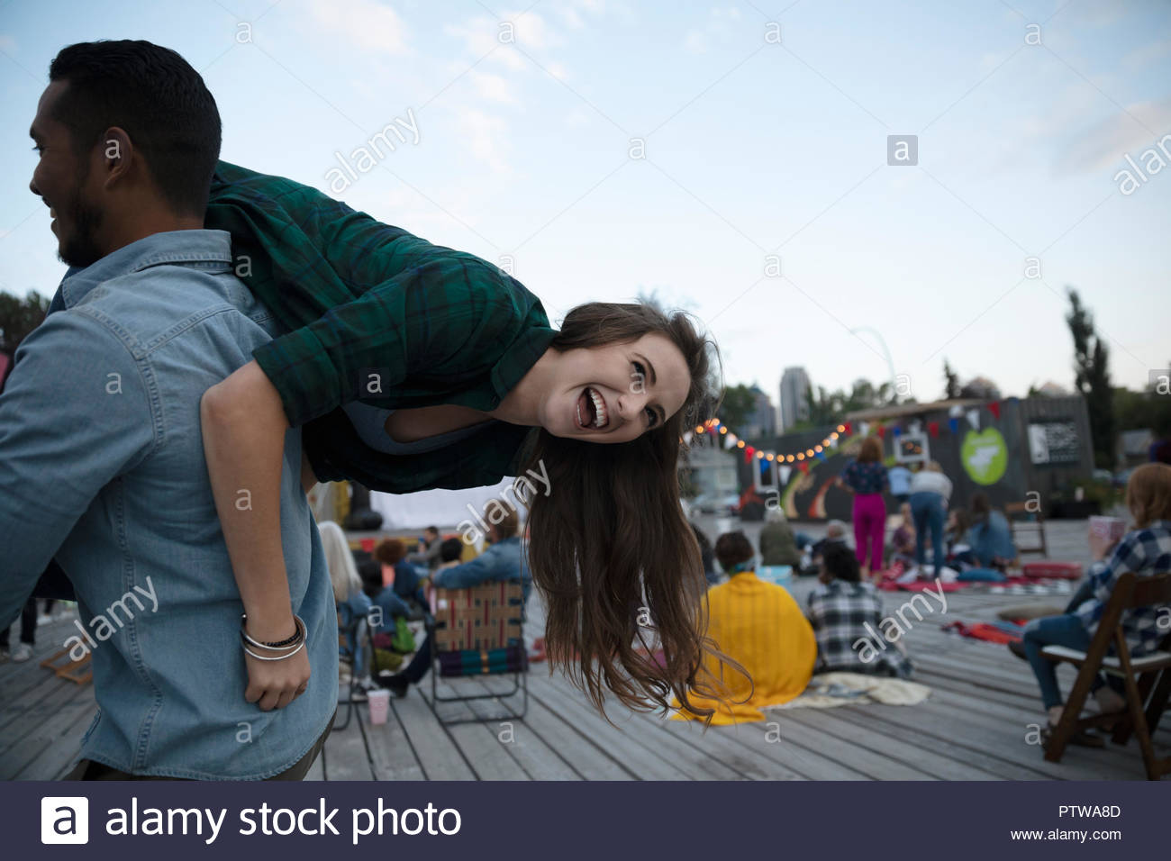 Man shoulder carrying woman hi-res stock photography and images - Alamy Man shoulder carrying woman hi-res stock photography and images - Alamy