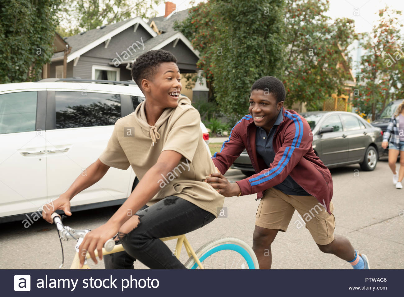 African boy on bicycle hi-res stock photography and images - Alamy