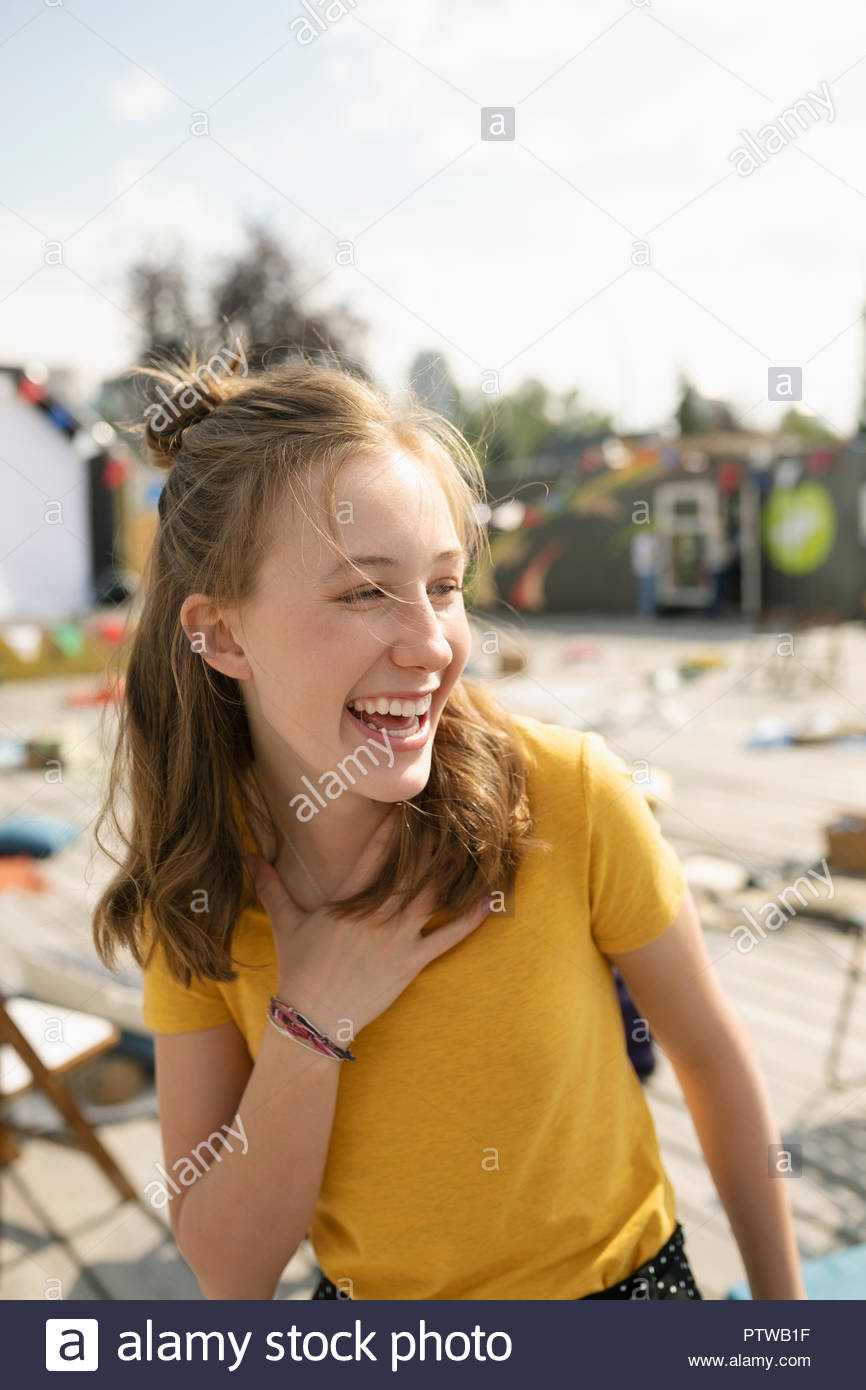 Girl teenager blonde laughing hi-res stock photography and images - Alamy